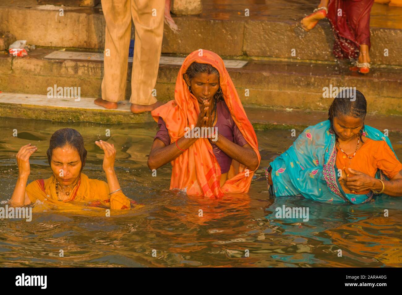 In the morning, Prayer at ghats of holy Ganges river, also Ganga river ...