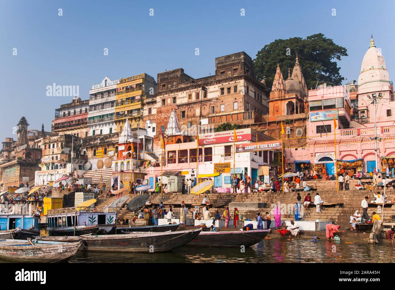 Scenic morning view of Holy ghats beside Ganges river, also Ganga river ...