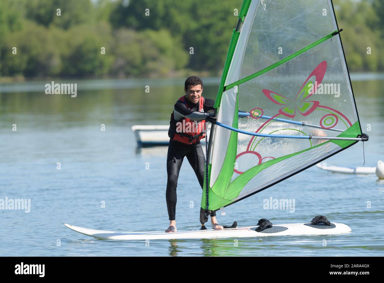 a man during wind surfing practice Stock Photo - Alamy