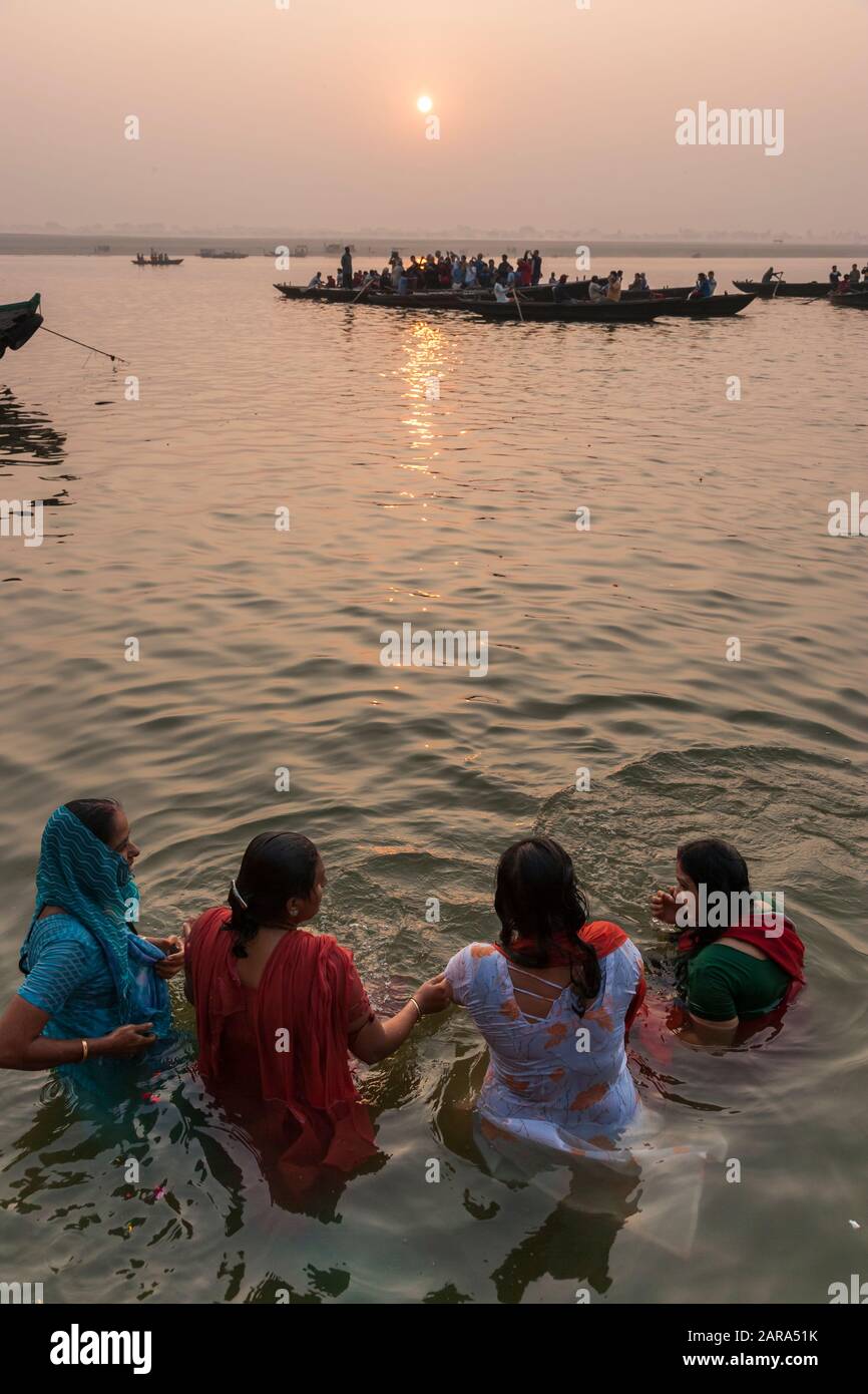 In morning, Prayer at ghats of holy Ganges river, also Ganga river ...