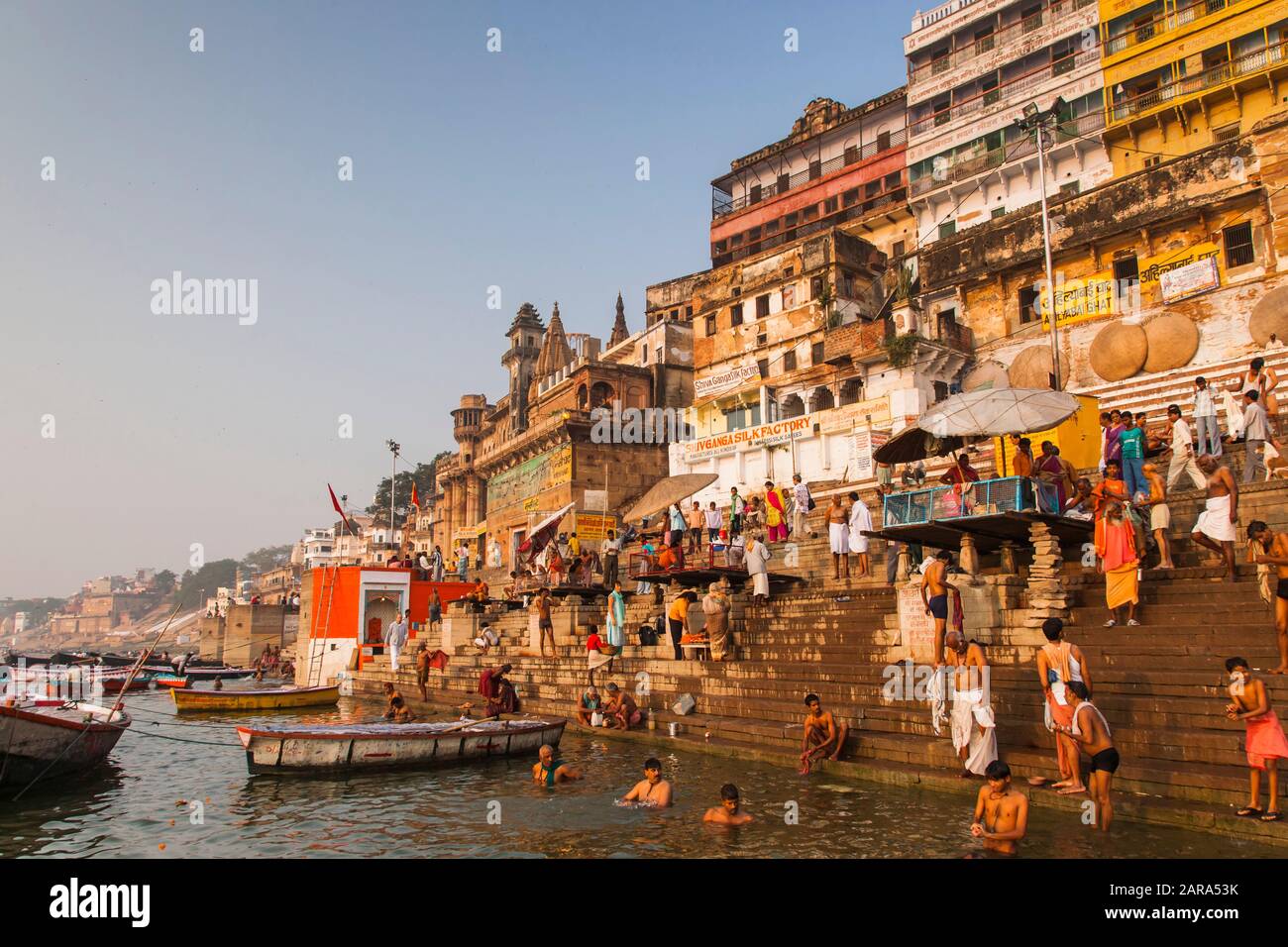 Scenic morning view of Holy ghats beside Ganges river, also Ganga river ...