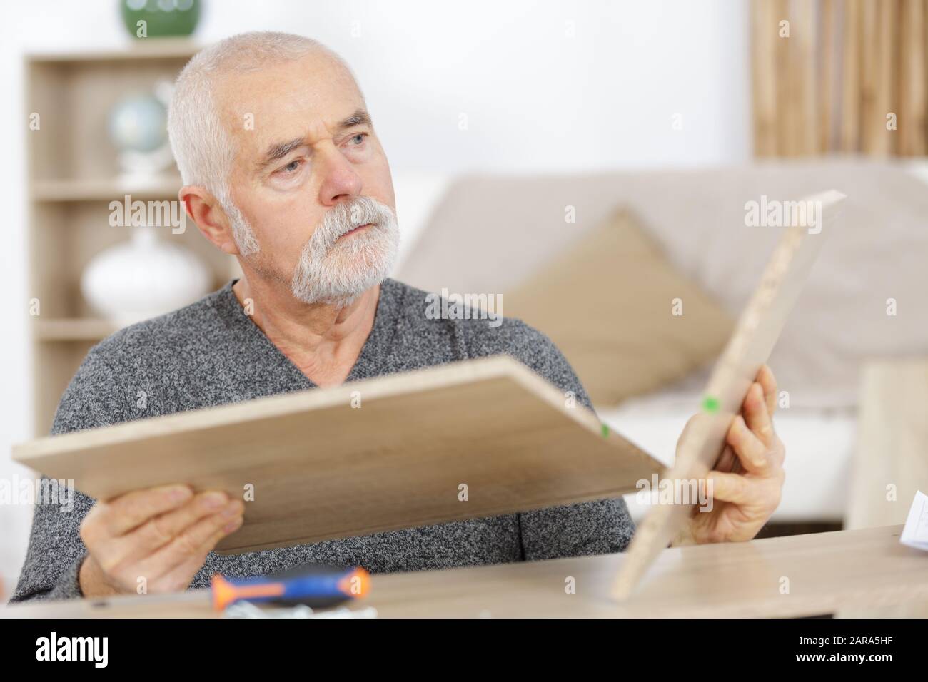 a senior wood professional during assembly Stock Photo - Alamy