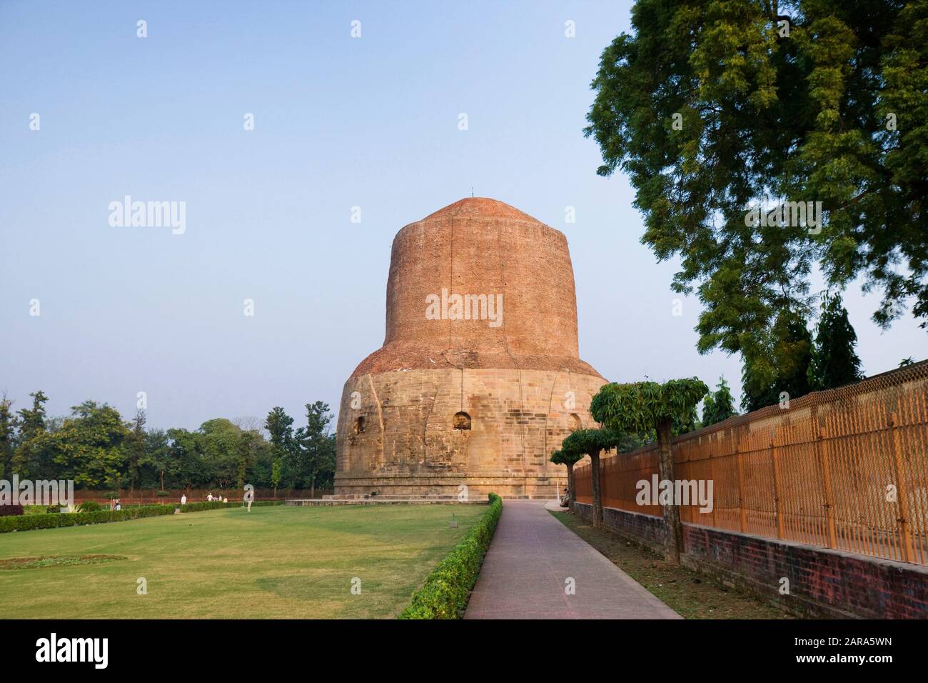 Old Dhamekh stupa at Buddhism holy Sarnath in late afternoon, suburb of ...