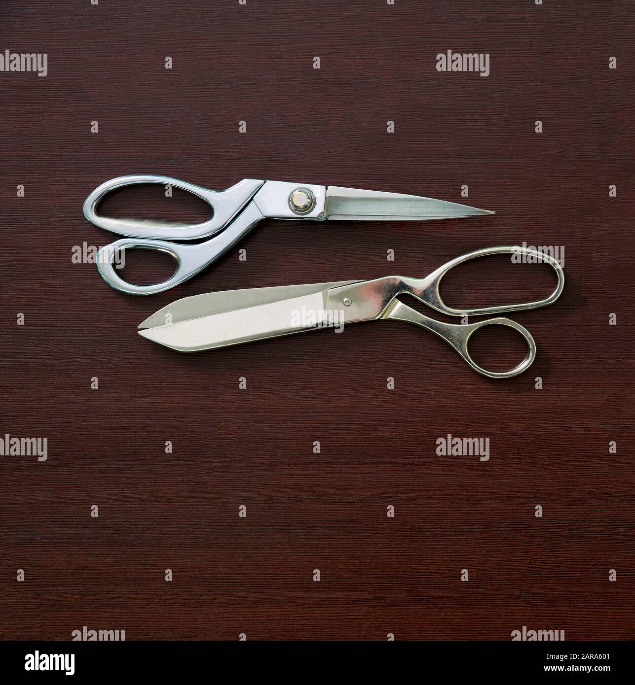 Group of sewing objects lying flat on a black chalkboard background ...