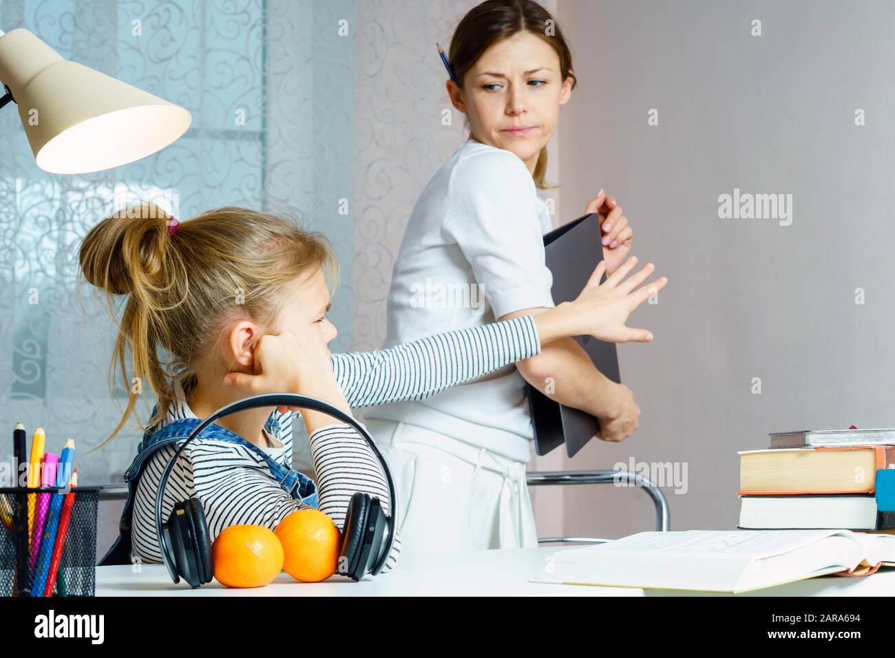Mother Arguing With Teenage Daughter Over Online Activity Stock Photo ...