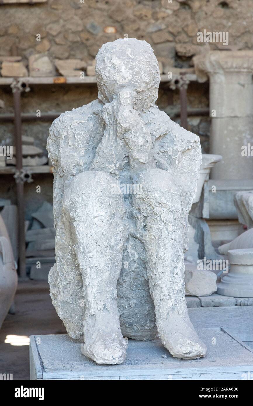 Plaster cast of the victim of the eruption of the volcano Vesuvius in ...