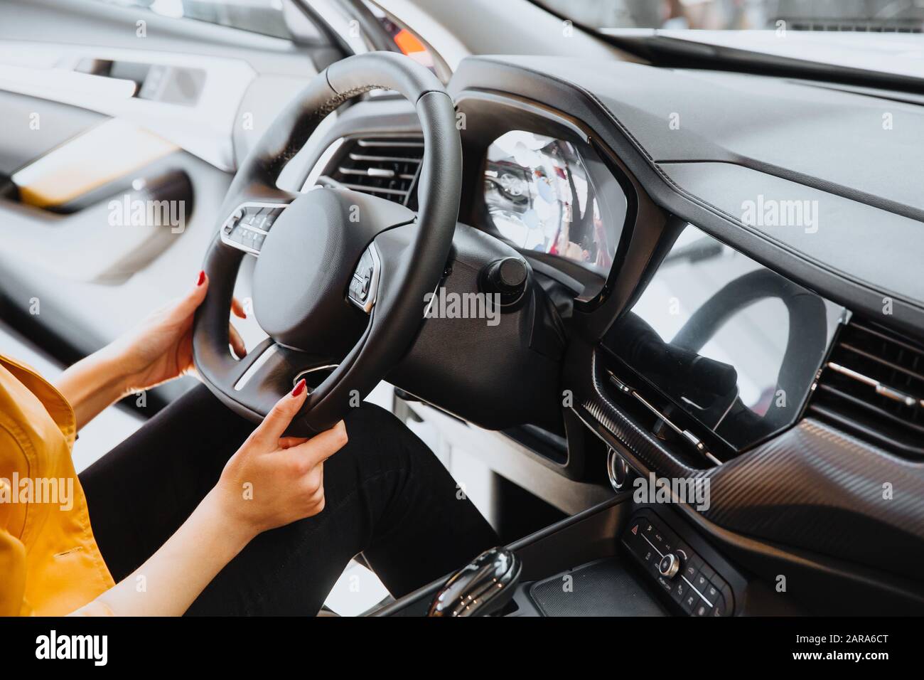 Female hands on steering wheel hi-res stock photography and images - Alamy