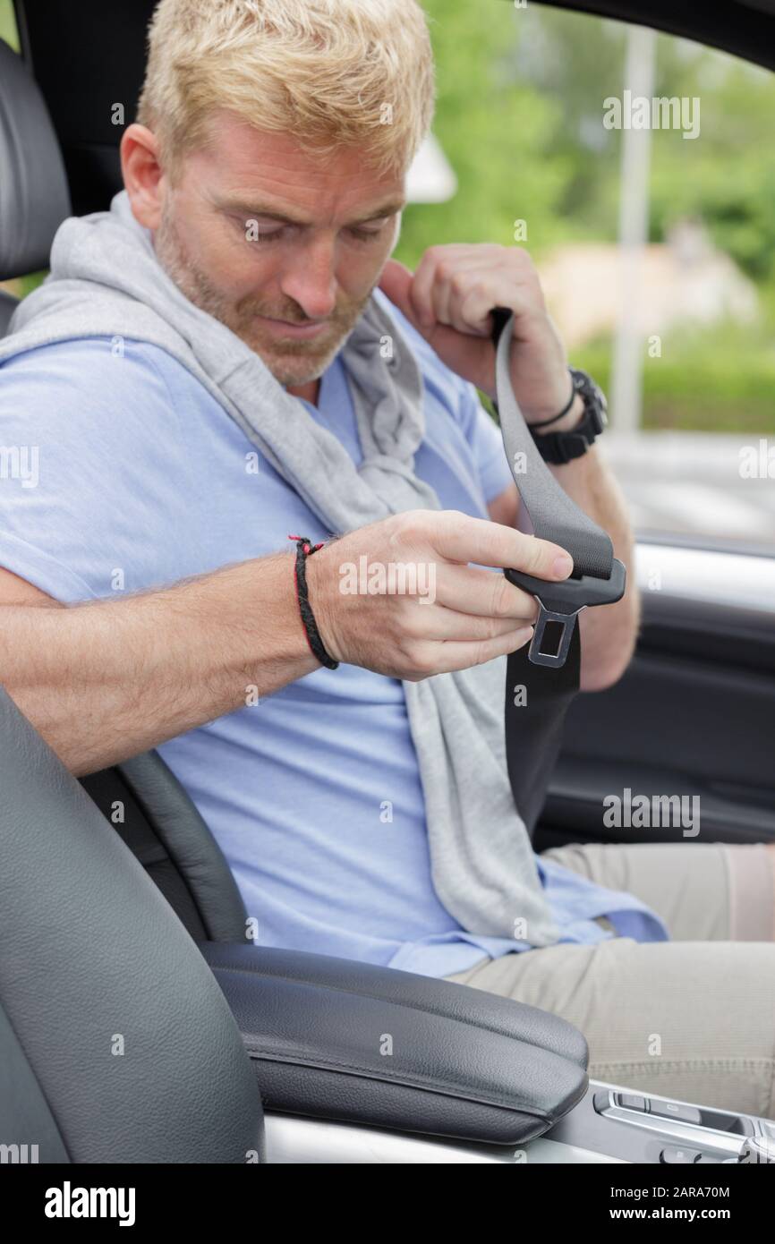 Man driving car puts hi-res stock photography and images - Alamy