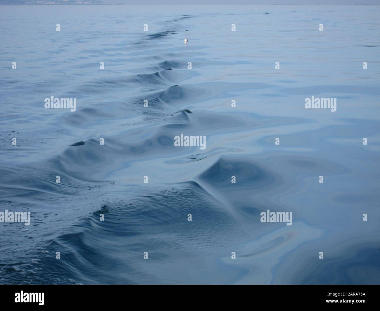 Sea in background with small ripples Stock Photo - Alamy