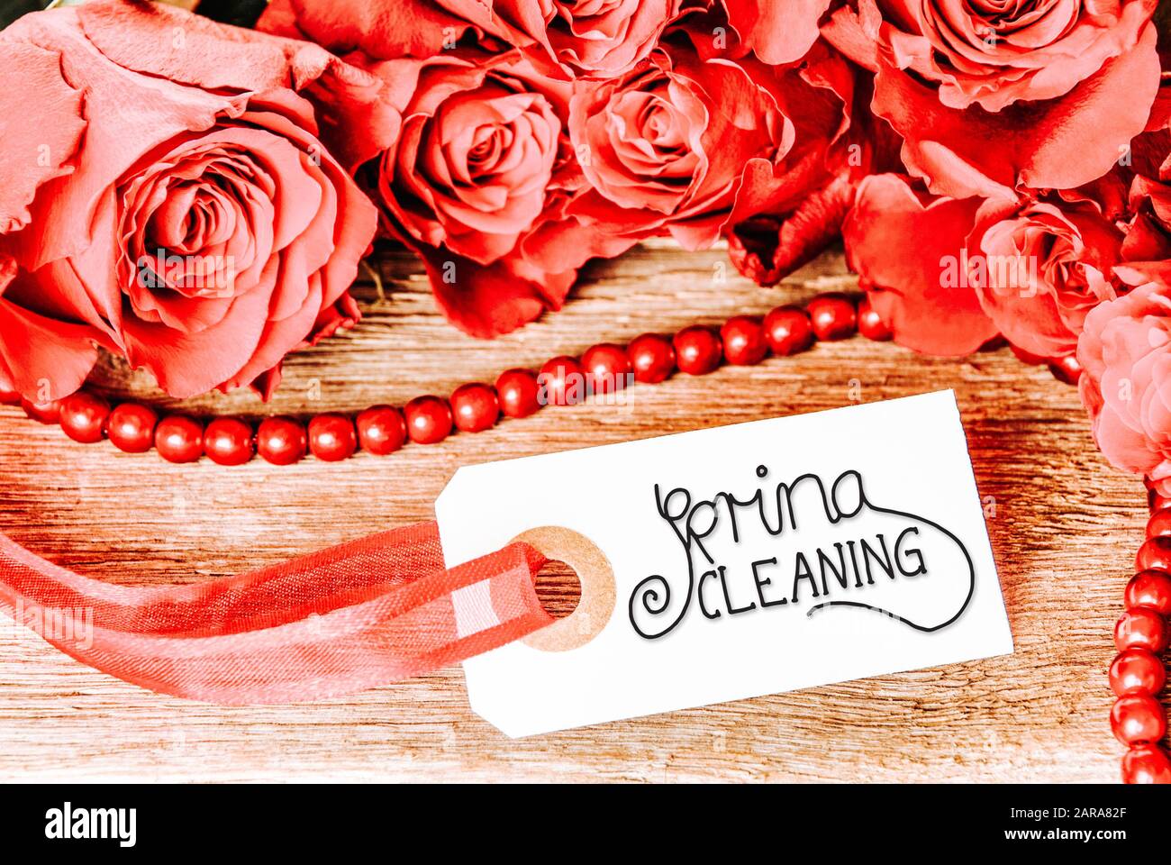 Label With Calligraphy Spring Cleaning, Rose Flower Stock Photo - Alamy