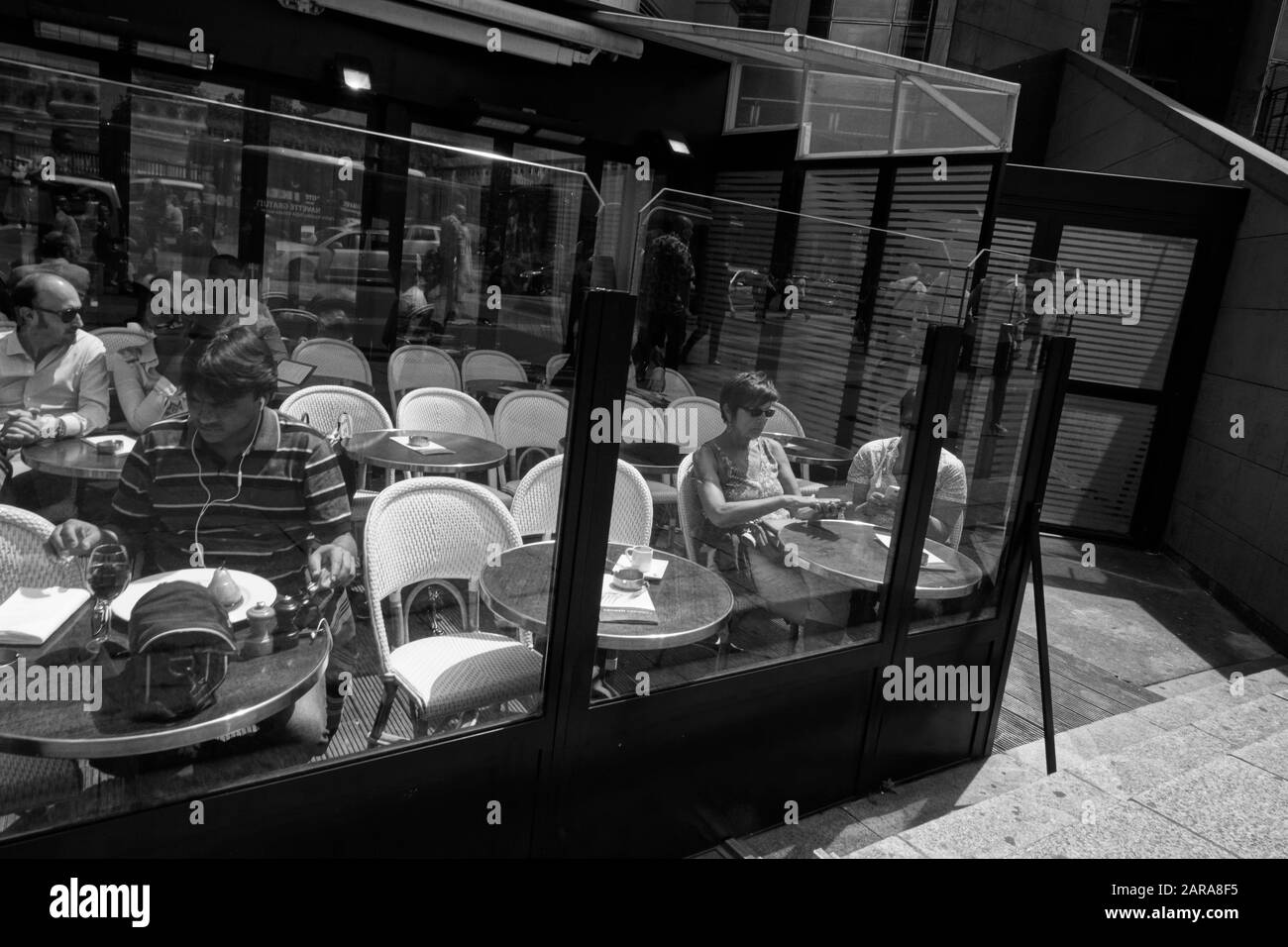 Urban cafe glass Black and White Stock Photos & Images - Alamy