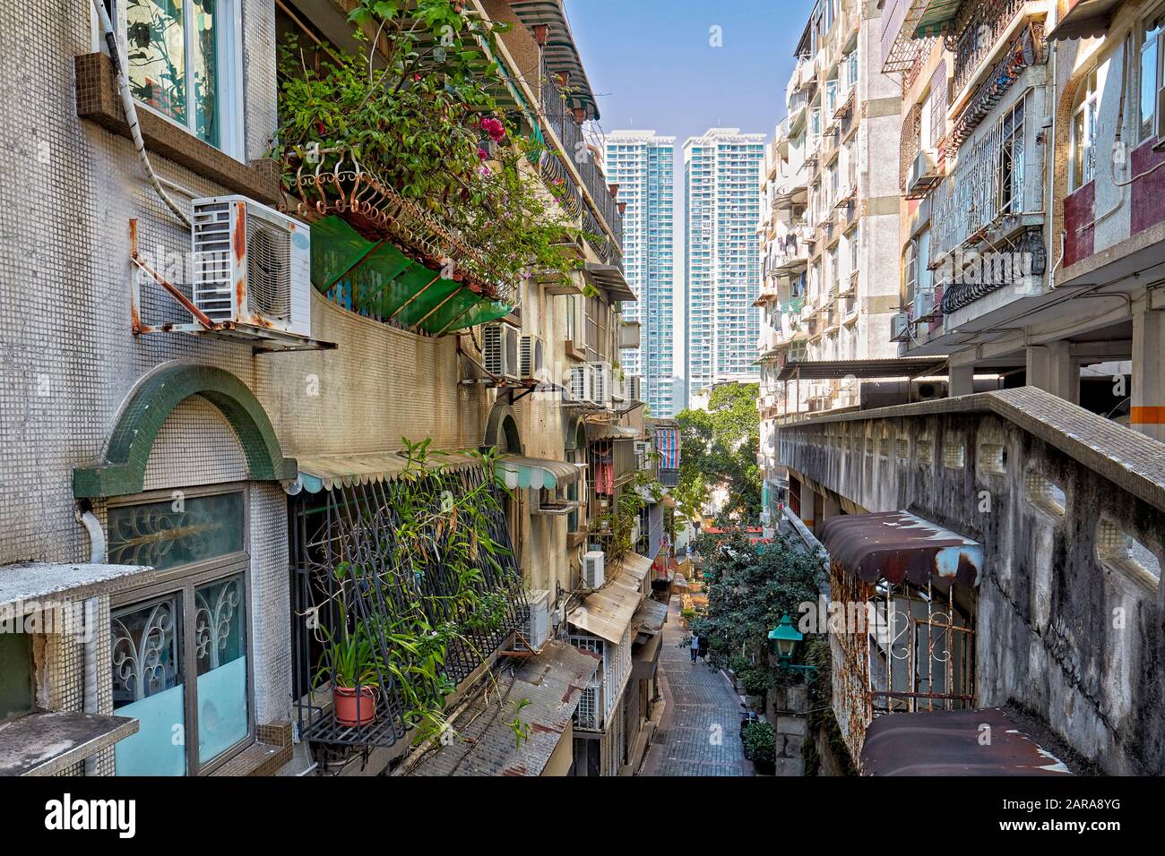 Residential buildings with fenced windows and balconies in historic ...