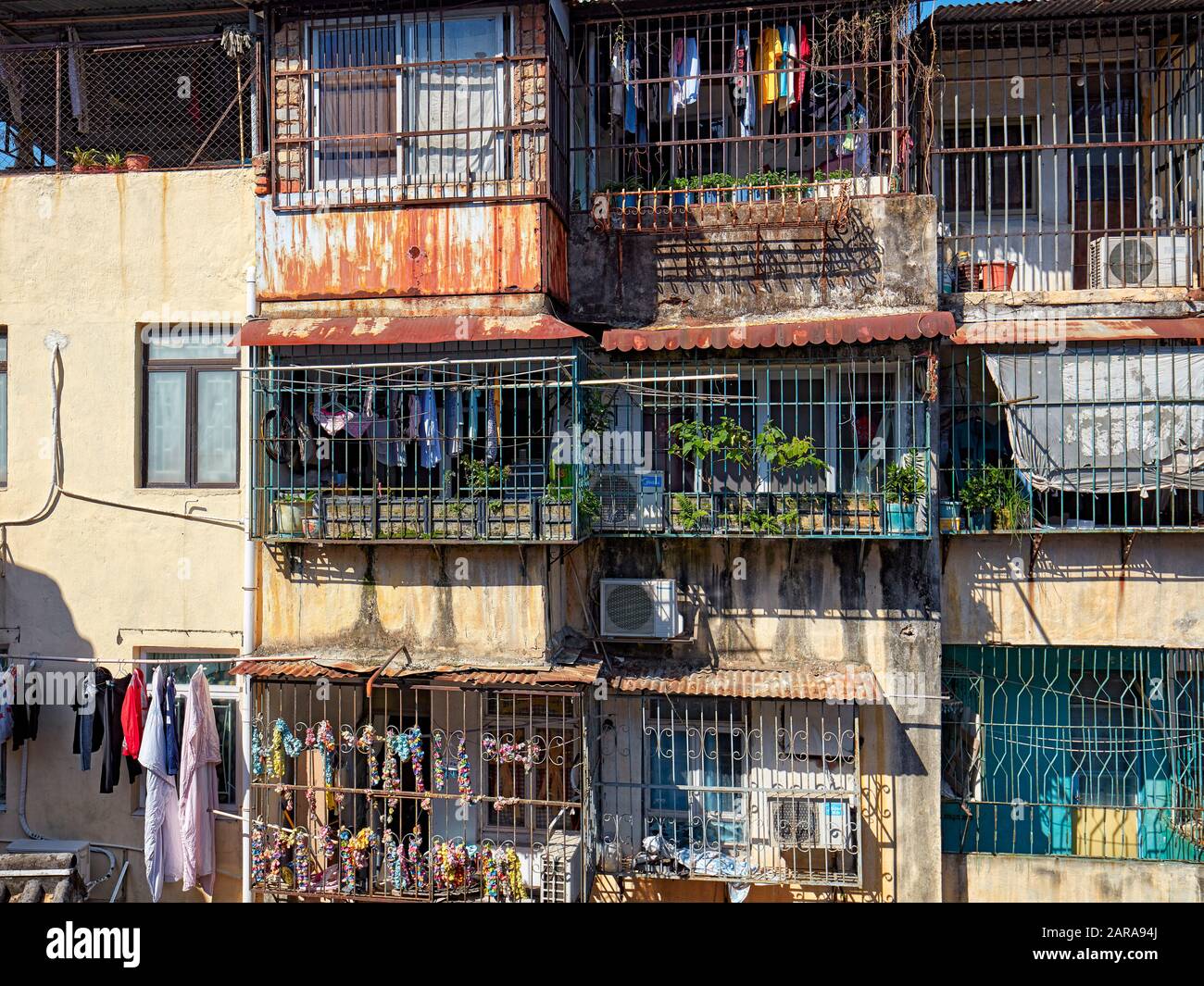 Fenced balconies on a multi-storey residential building in historic ...