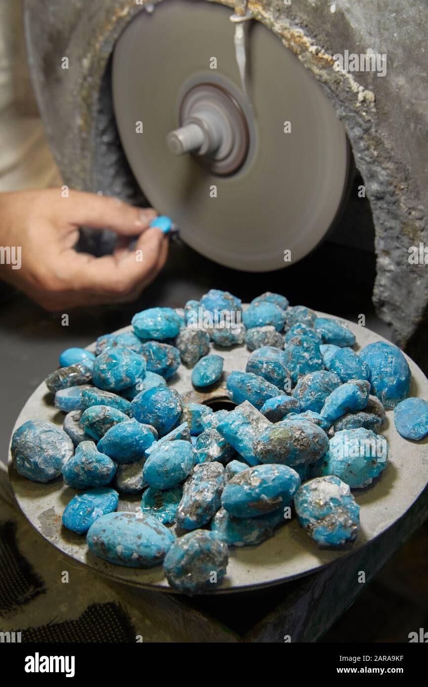 Mashhad, Iran. 14th June, 2017. Turquoise stones are machined and ...