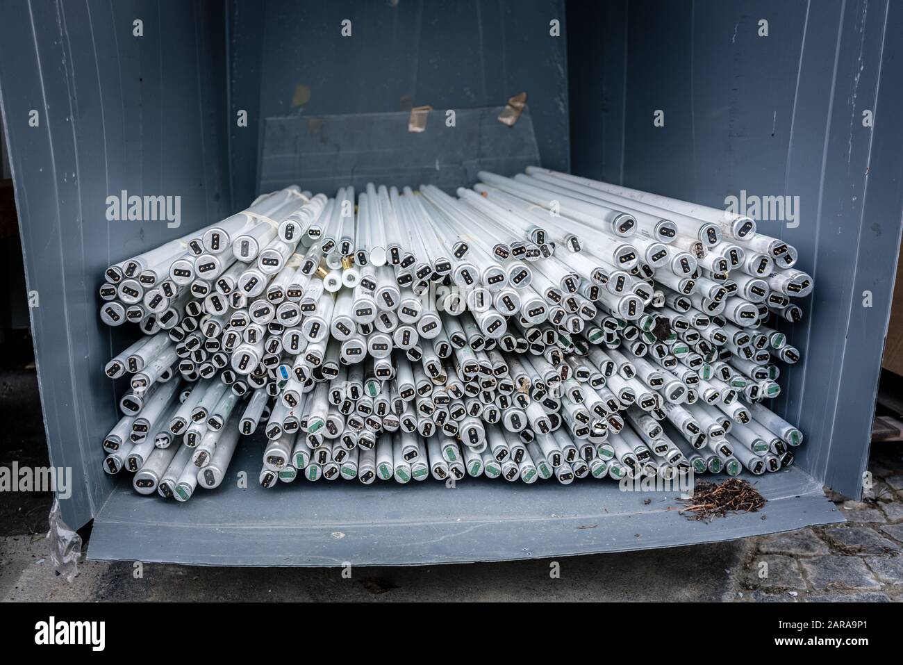 Florescent tubes in container on recycling center Stock Photo - Alamy