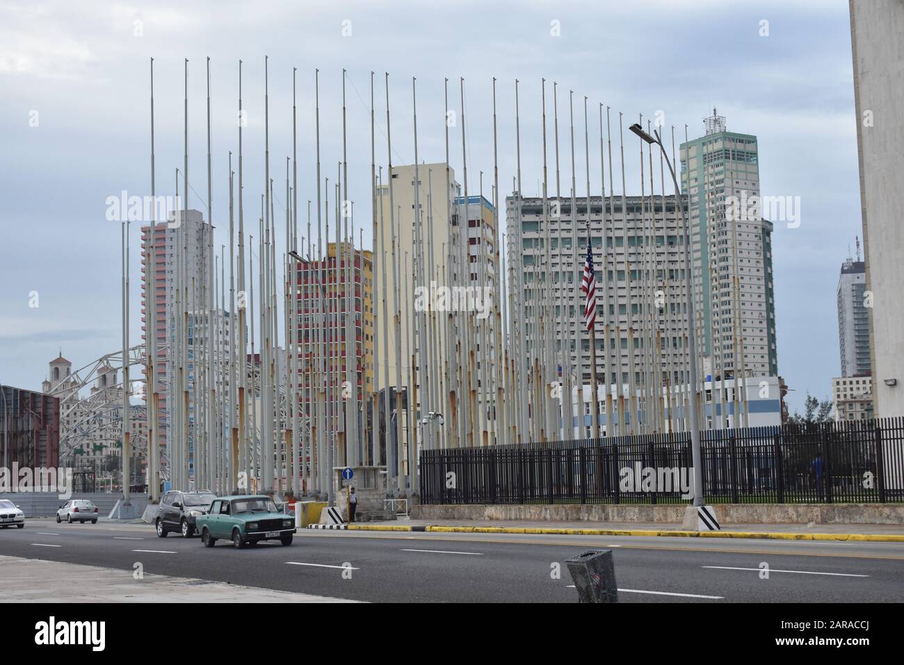 Many flagpoles along el Malecon Havana CUba near US embassy Stock Photo ...