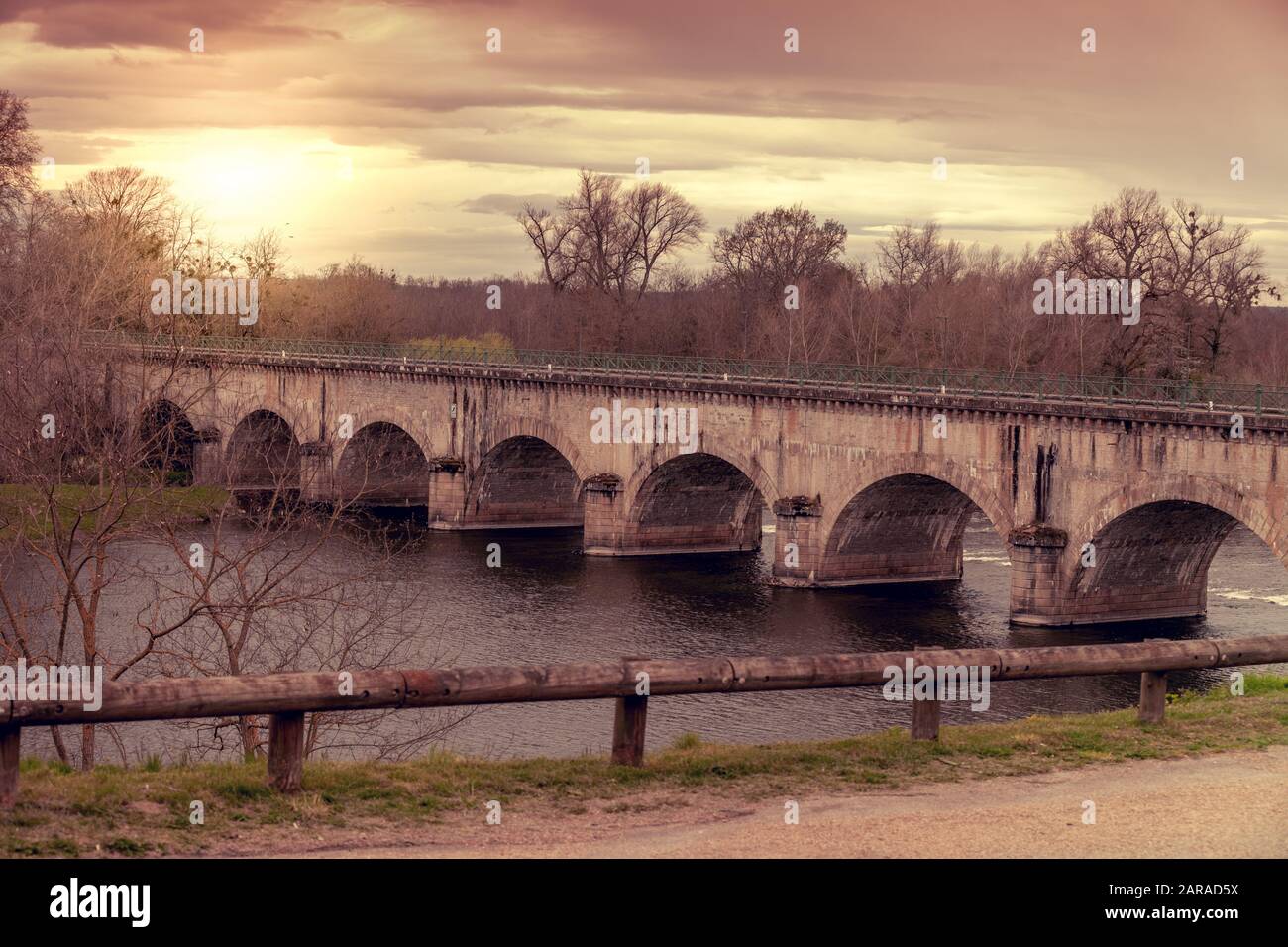 Digoin canal bridge. Boat canal bridge over Laura river in early spring ...