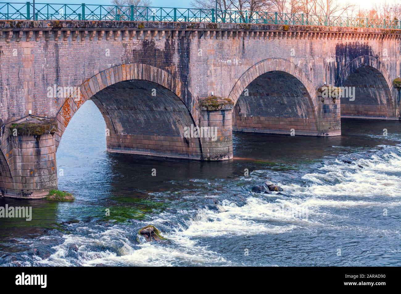 Digoin canal bridge. Boat canal bridge over Laura river in early spring ...