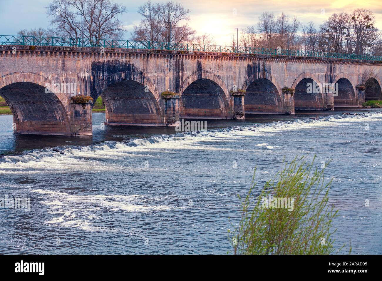 Digoin canal bridge. Boat canal bridge over Laura river in early spring ...