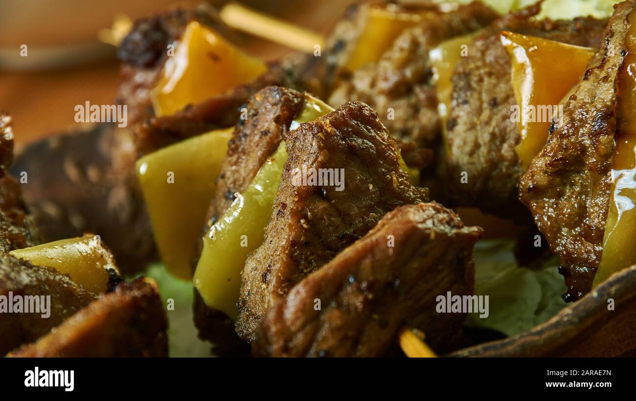 Mshikaki, street food dish , skewered pieces of marinated meat such as ...