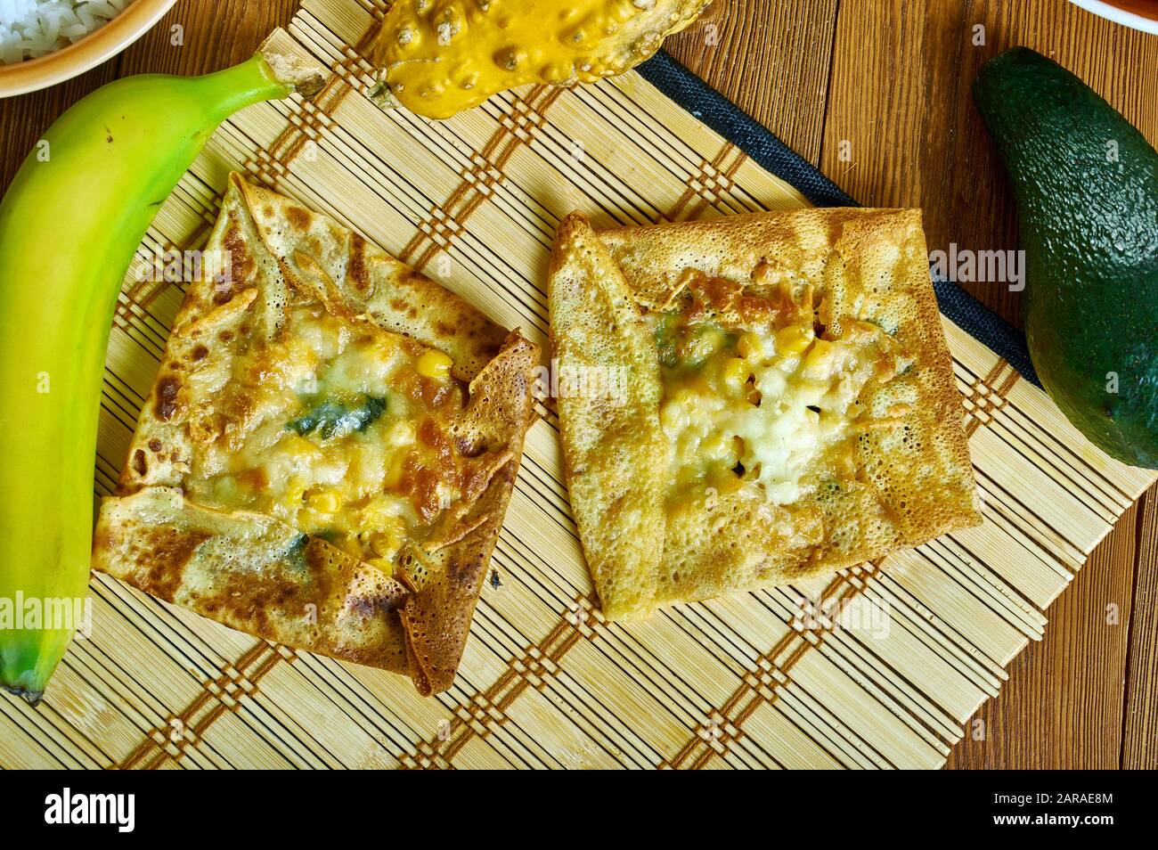 Zanzibar pizza, crispy pancakes with as many meats, sweets, or ...