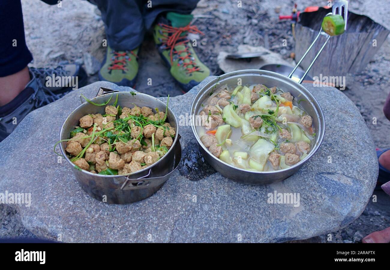 Vegetarian camping food in a outdoor trekking adventure in the Himalaya ...