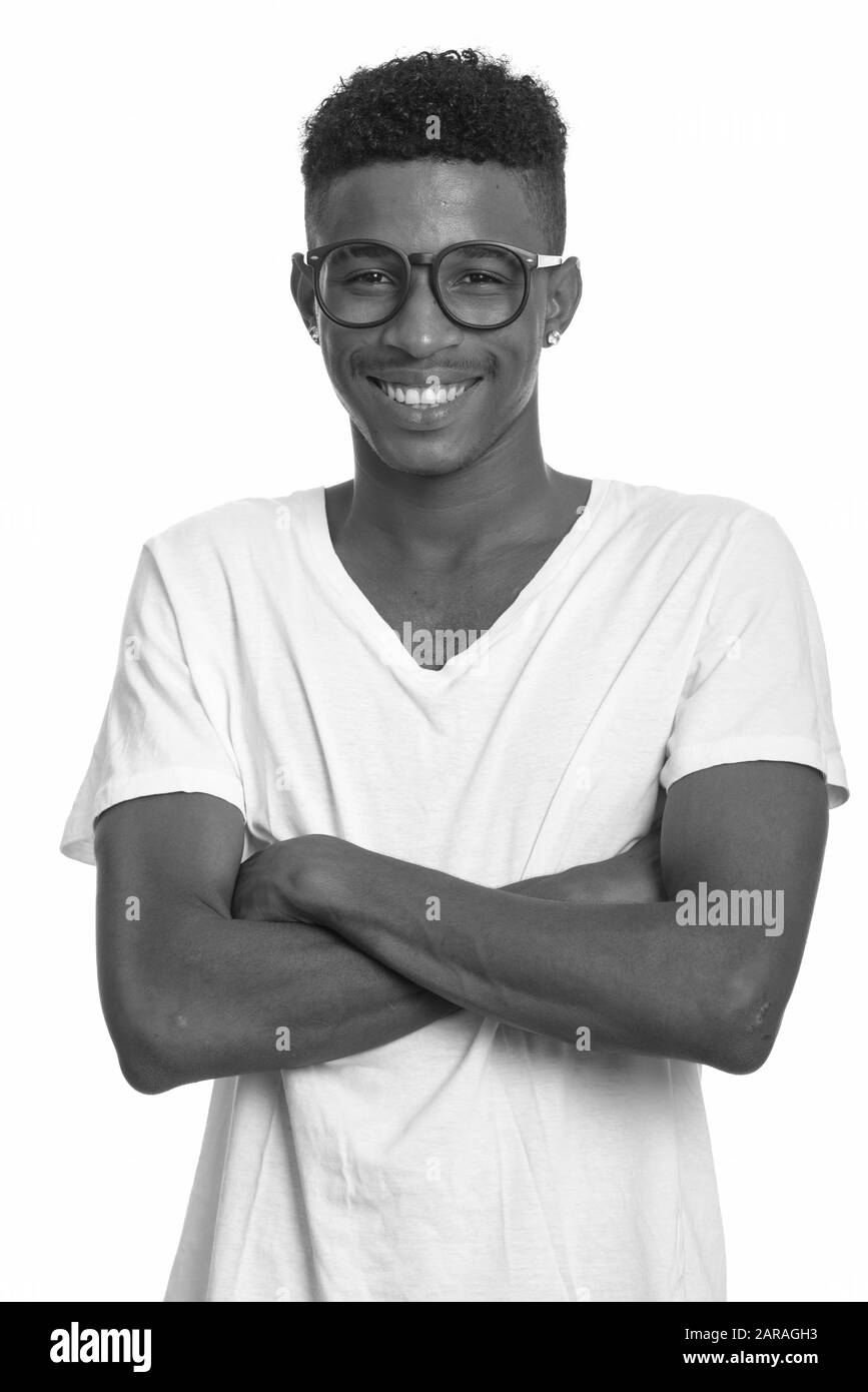 Studio shot of young handsome African man with Afro hair isolated ...