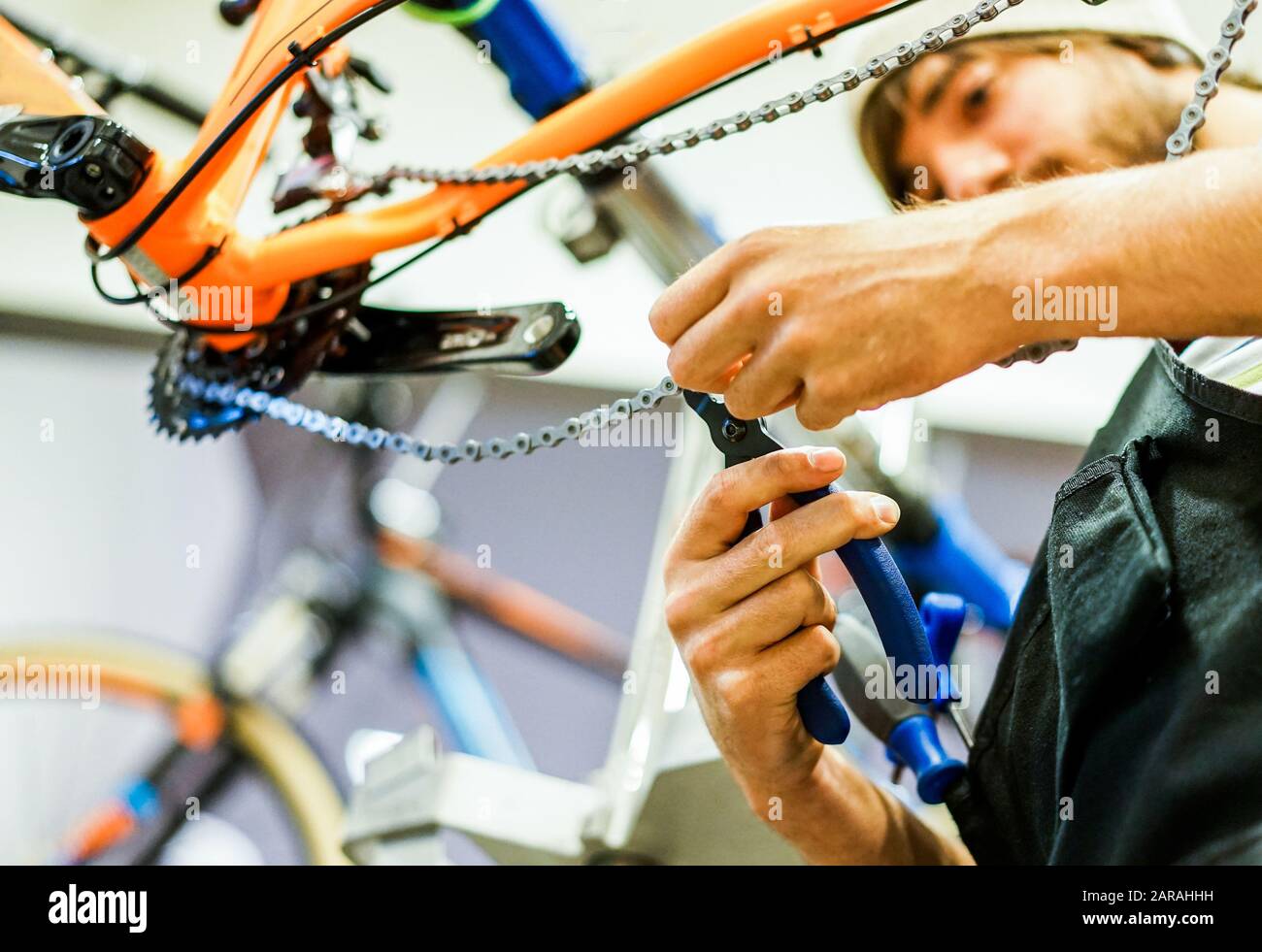 Person oiling gear bicycle hi-res stock photography and images - Alamy