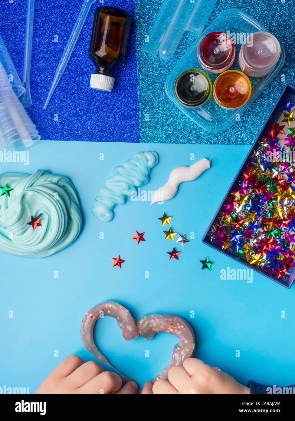 Components to making homemade slime. Shine slime with colorful ...