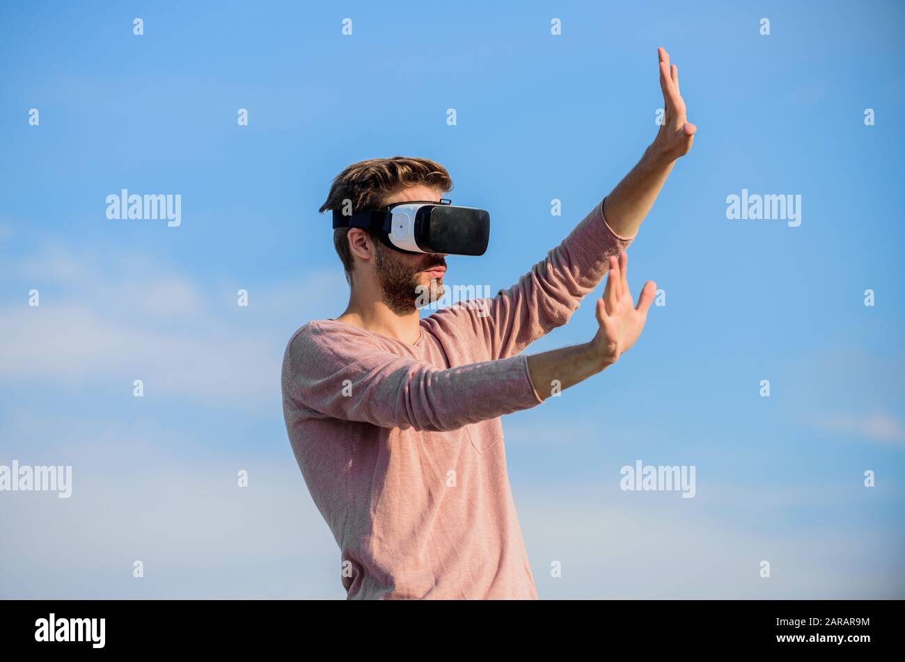 Virtual reality goggles. Man with wireless VR glasses headset ...