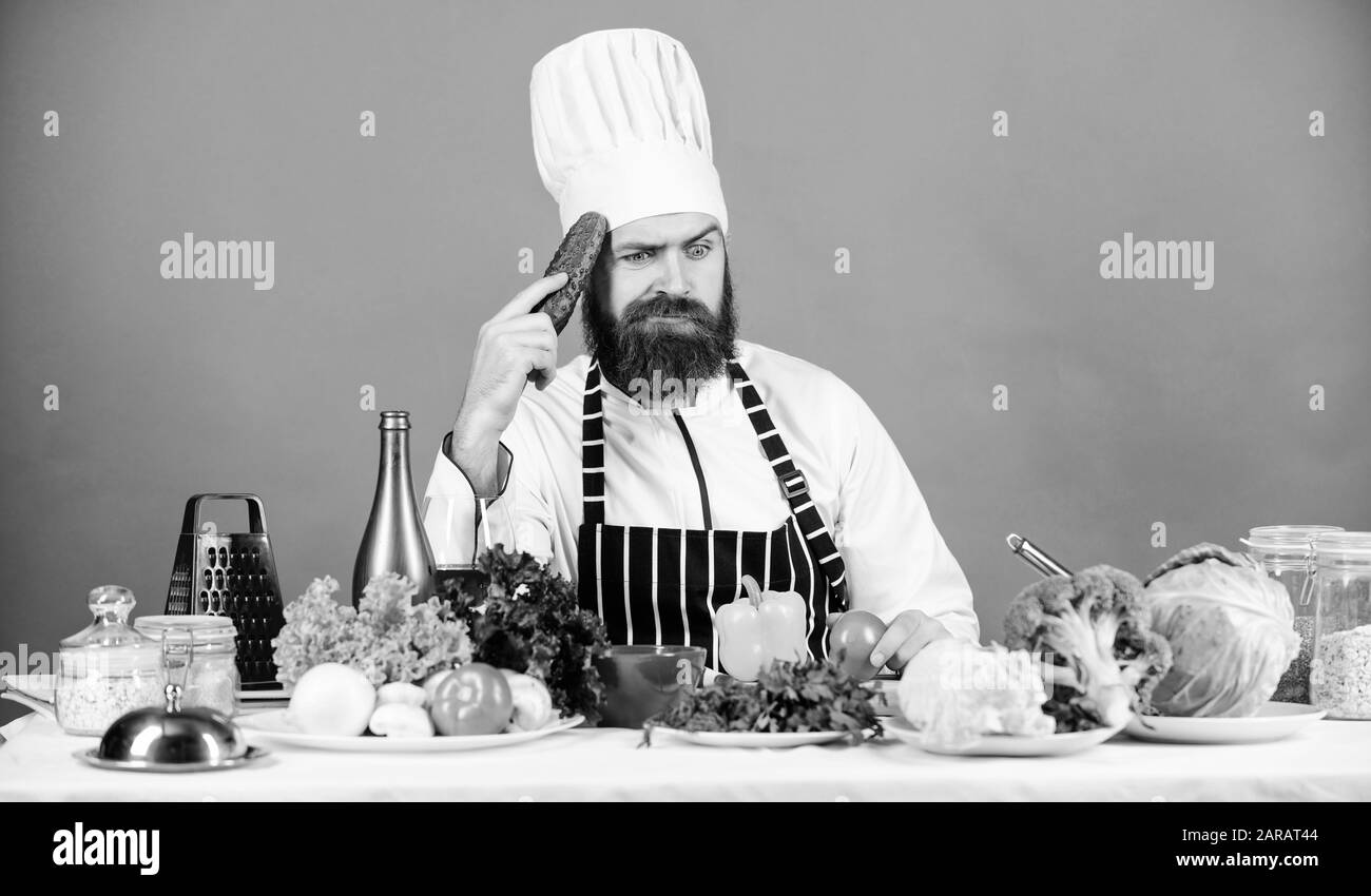 Delicious supper. Bearded man cook in kitchen, culinary. Healthy food ...