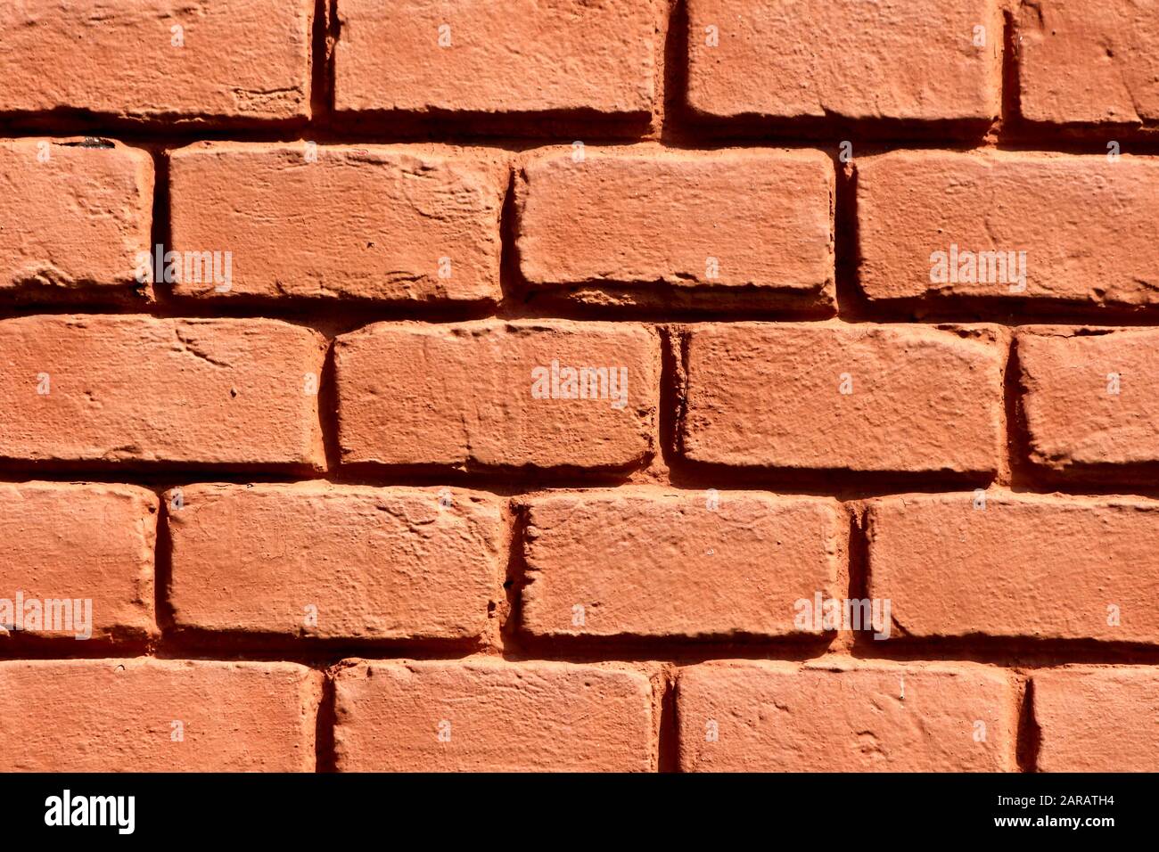 Newly painted old red brick suburban family house wall texture ...
