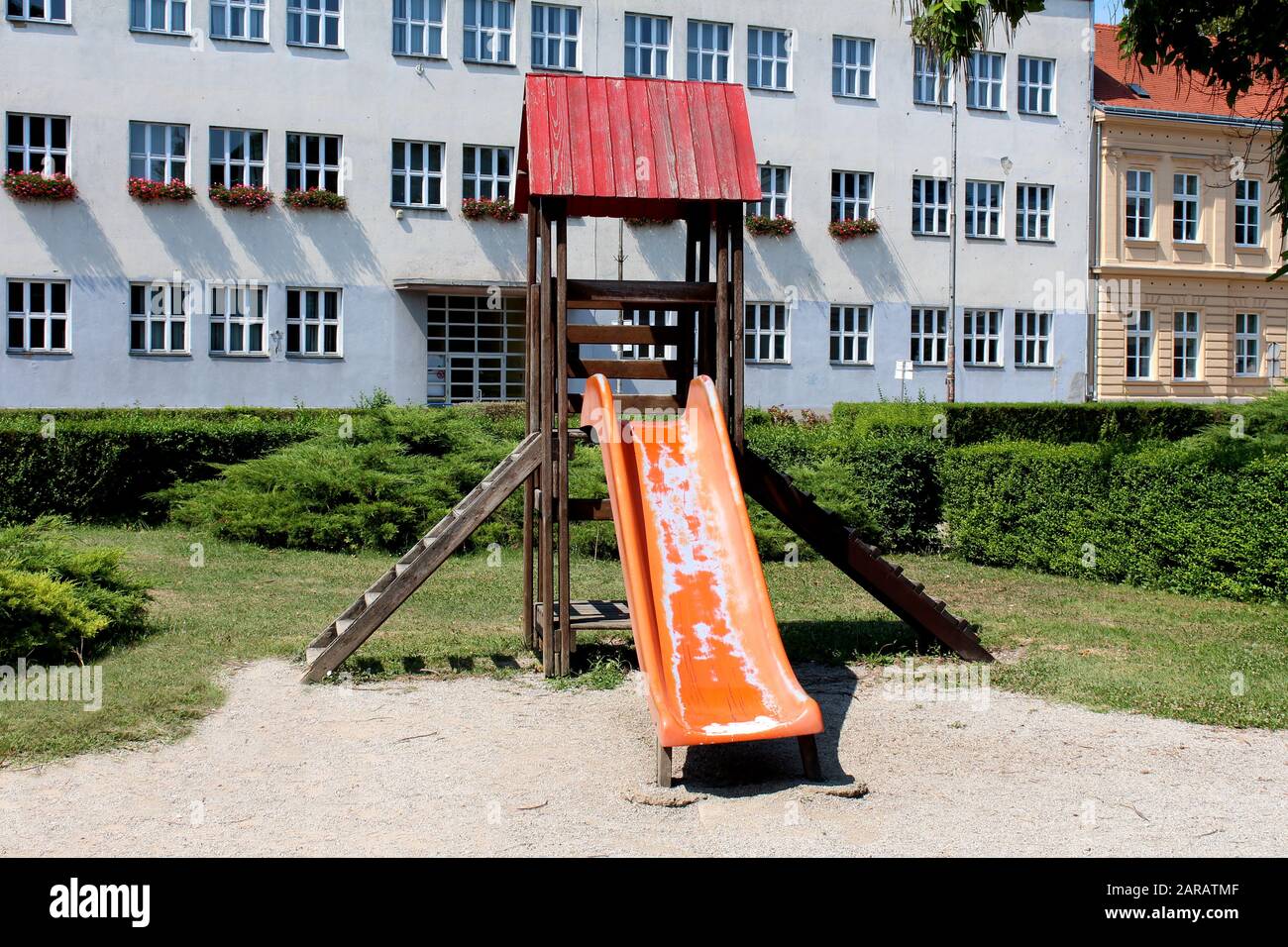 Old retro vintage outdoor wooden public playground equipment with ...