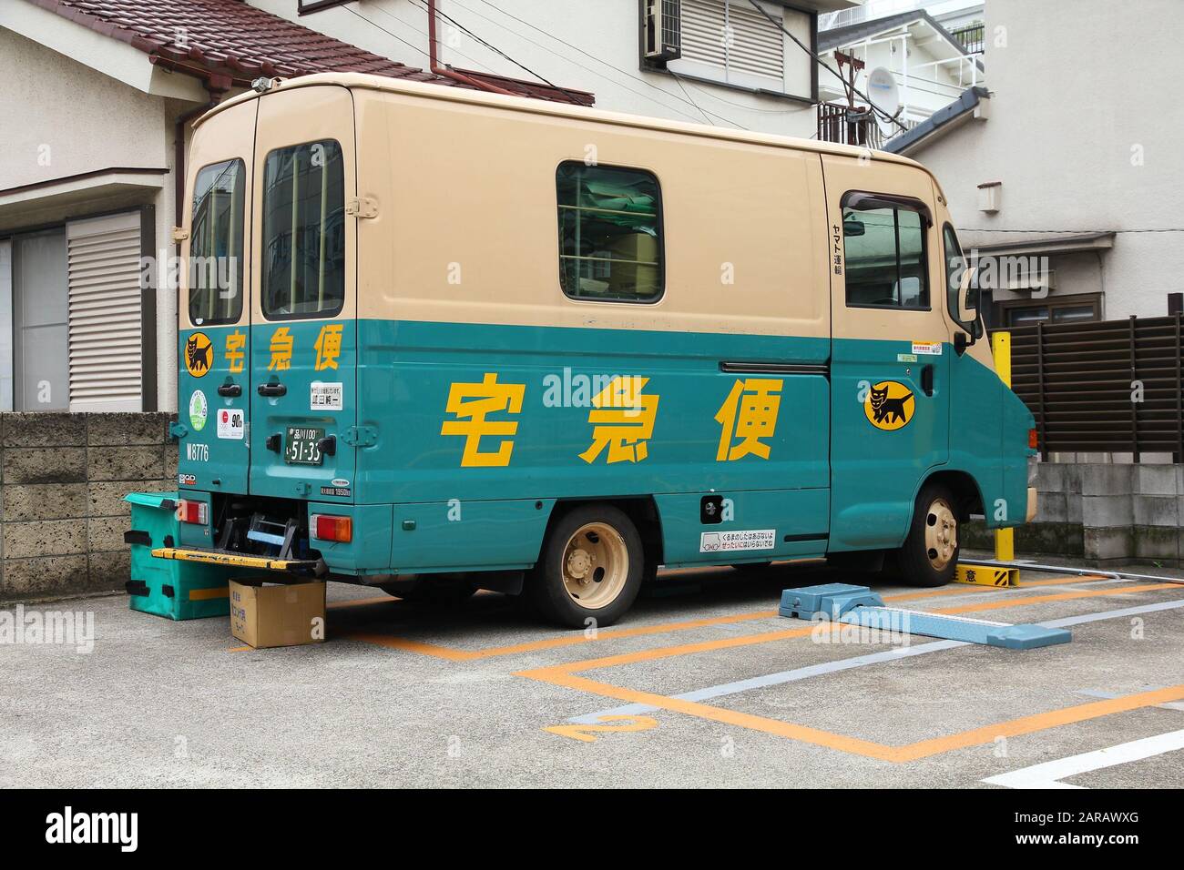 TOKYO, JAPAN - MAY 9, 2012: Yamato Transport delivery van in Tokyo ...