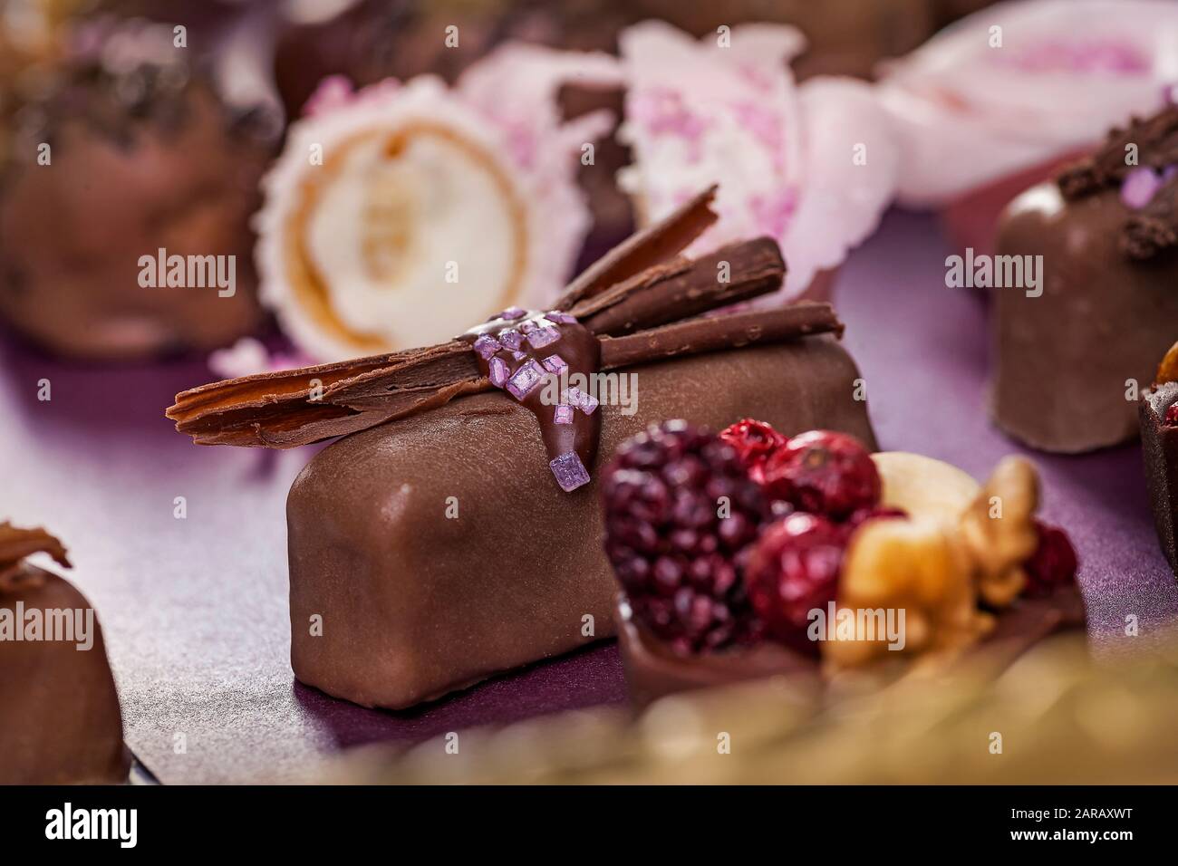 Date chocolate mignon and other small sweets Stock Photo - Alamy