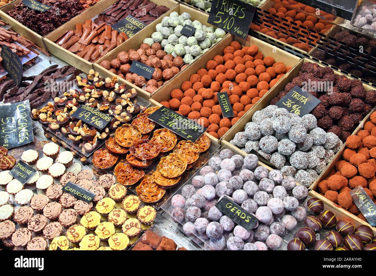 Confectionery at Boqueria market place in Barcelona, Spain. Assorted ...