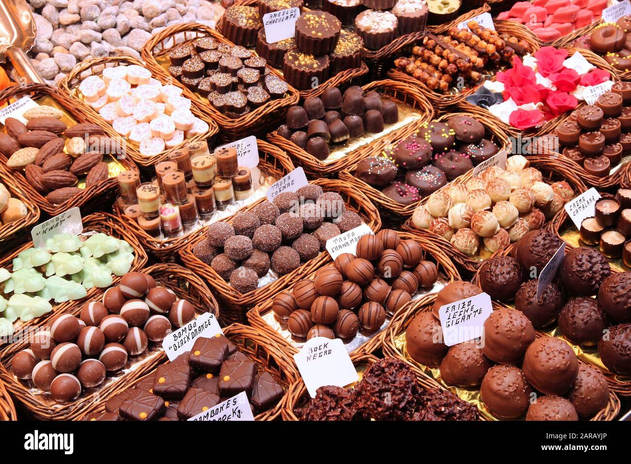 Confectionery at Boqueria market place in Barcelona, Spain. Assorted ...