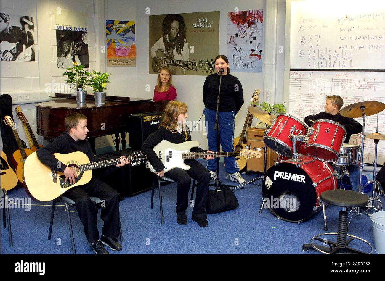 Children playing musical instruments hi-res stock photography and ...