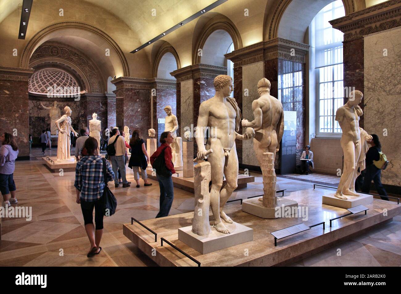 PARIS, FRANCE - JULY 22, 11: Tourists visit Louvre Museum in Paris ...