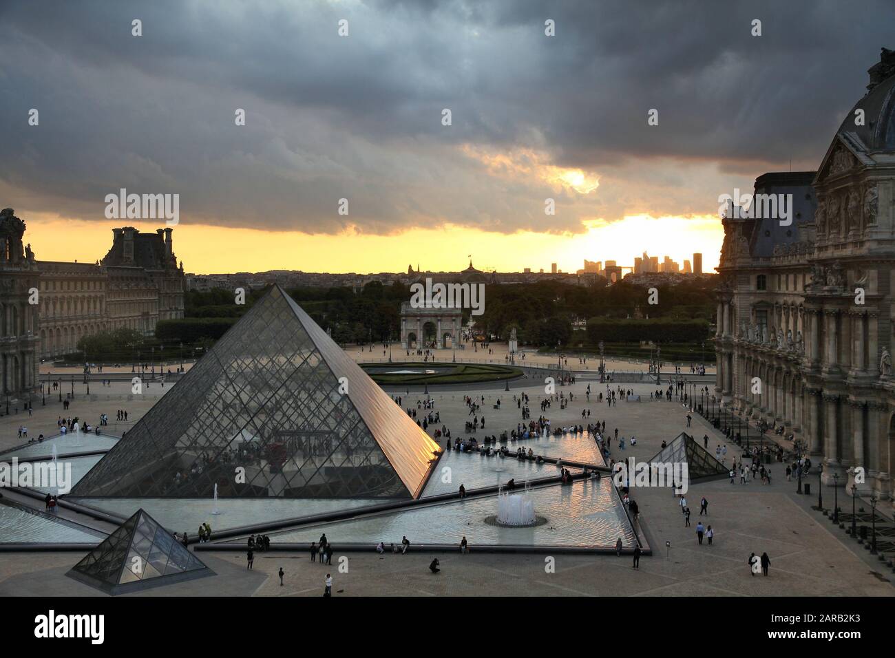 Louvre pyramid sunset hi-res stock photography and images - Alamy