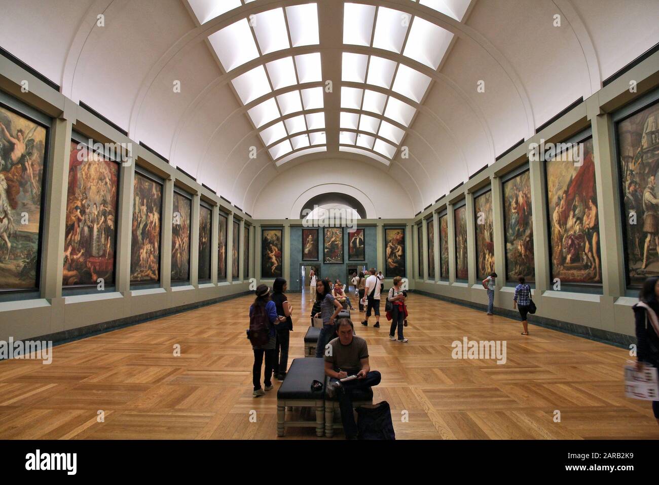 PARIS, FRANCE - JULY 22, 11: Tourists visit Louvre Museum in Paris ...