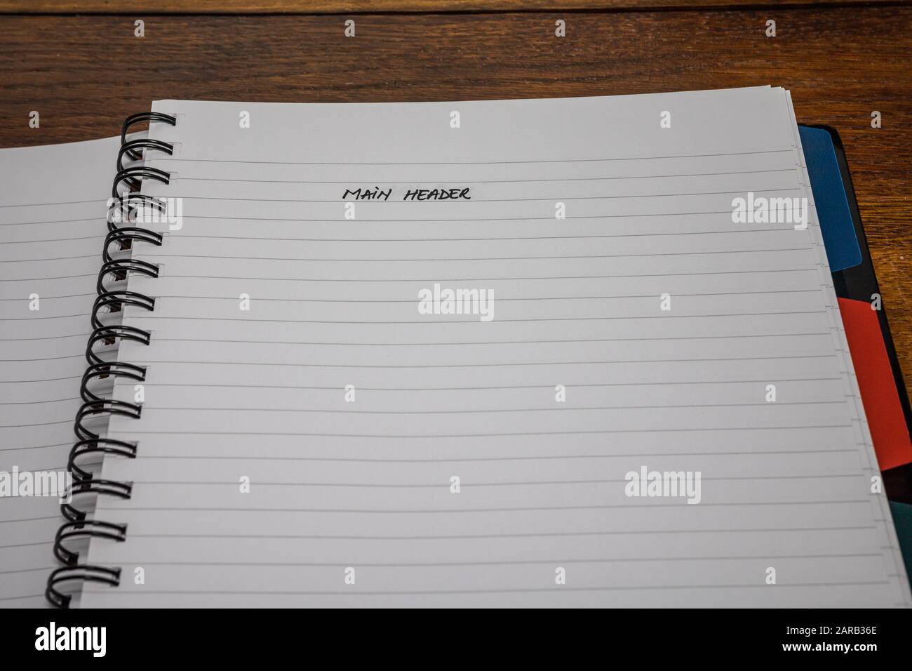 Main header, handwriting text on page of office agenda, office spiral ...