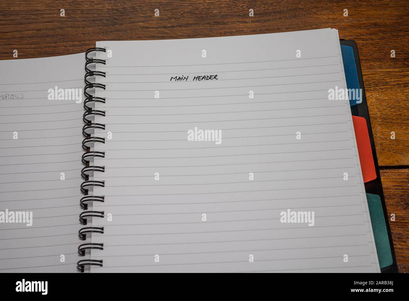 Main header, handwriting text on page of office agenda, office spiral ...