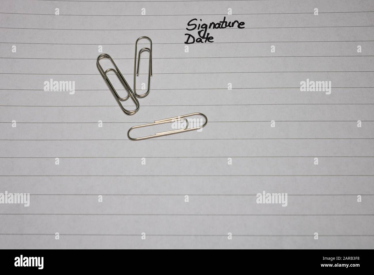 Signature and date, handwriting text on page of office agenda, office ...