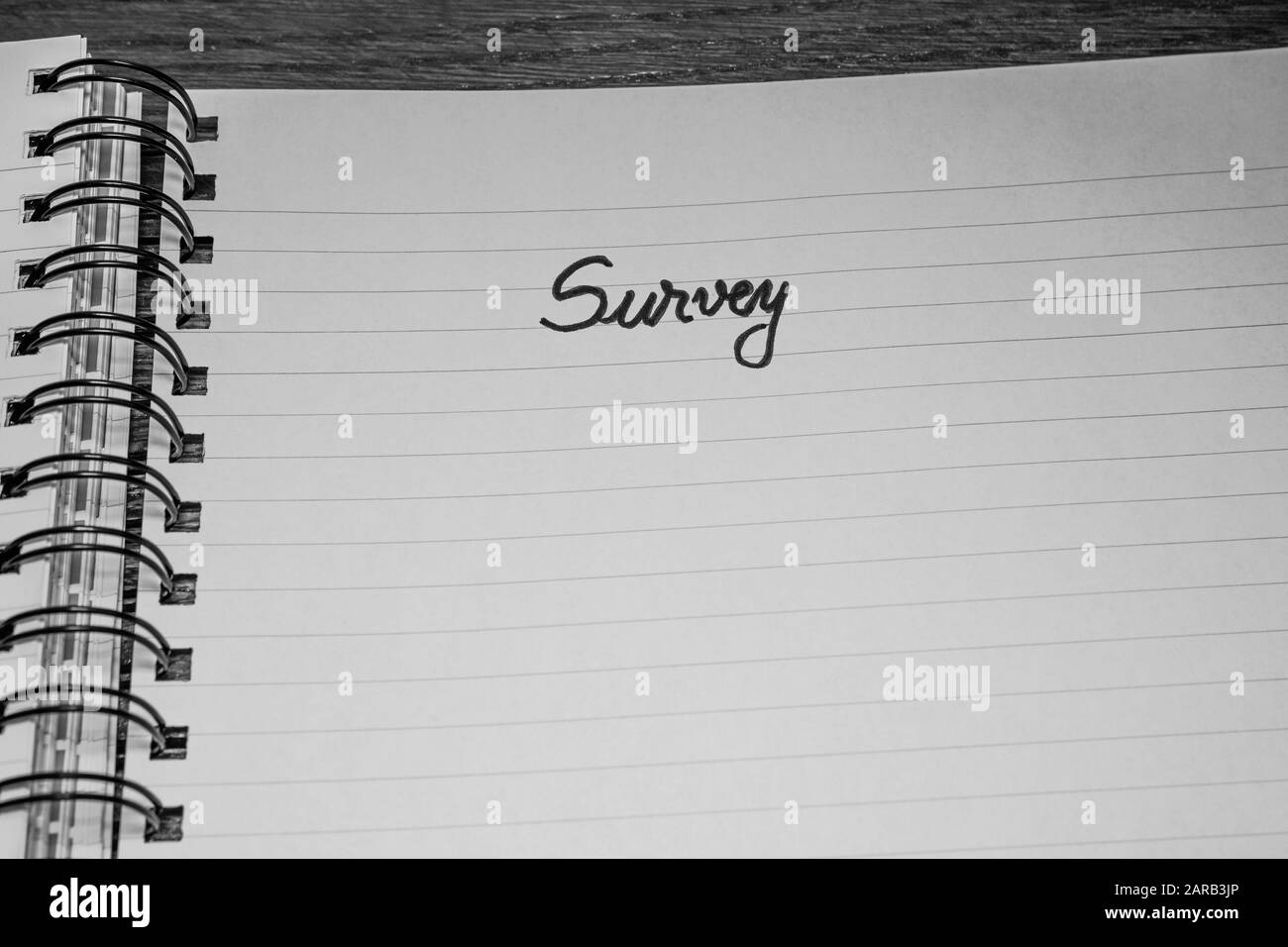 Survey, handwriting text on page of office agenda, office spiral ...