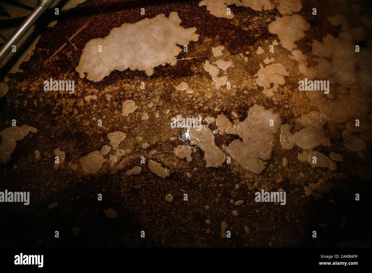 Brewing process. Fermentation of beer inside the vat Stock Photo - Alamy