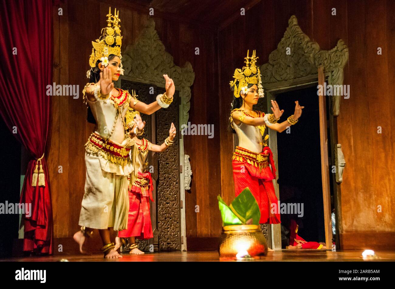 Two female dancers perform a traditional Cambodian dance in beautiful ...