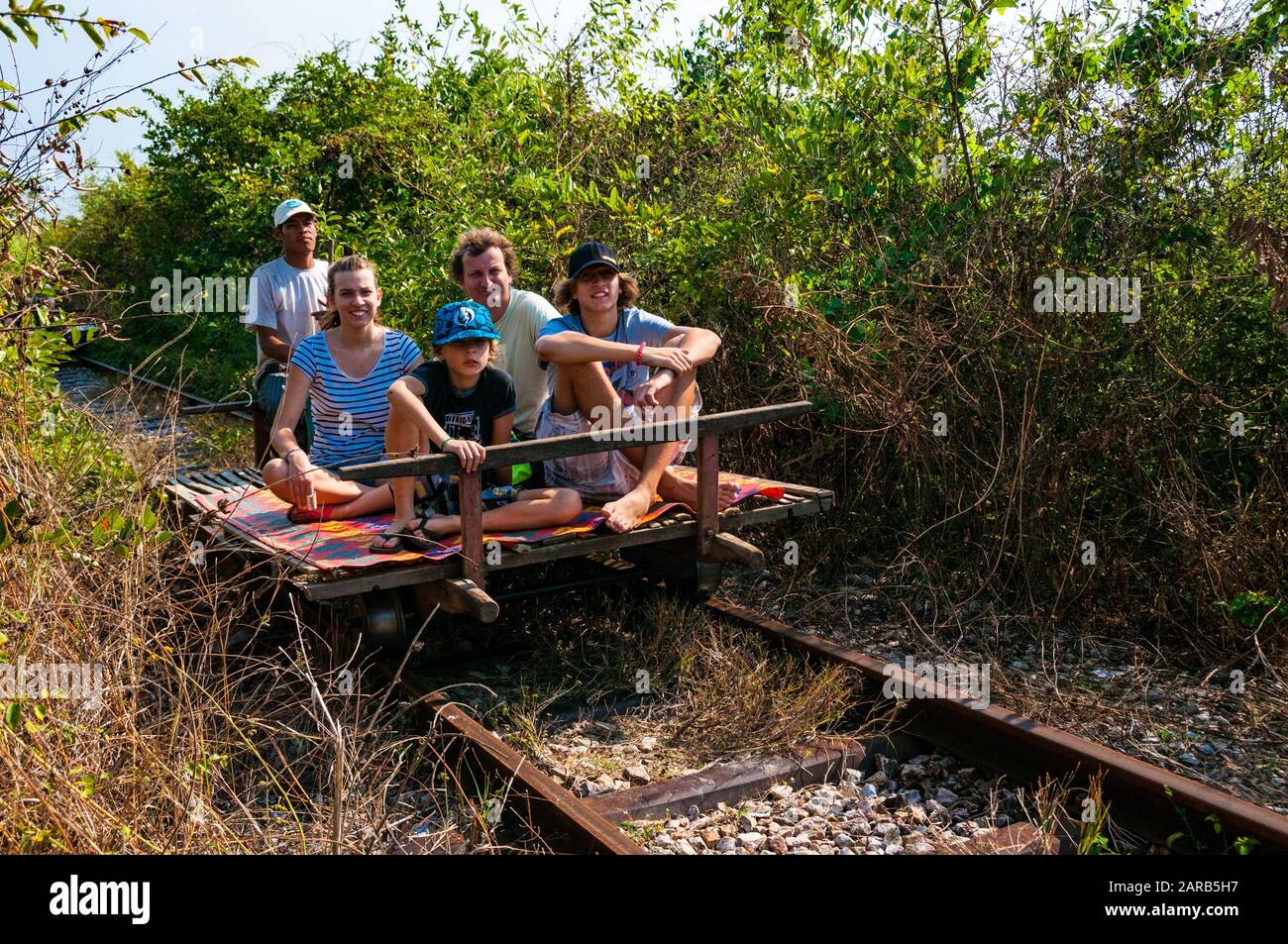 A family of tourists on the Bamboo train in Battambang, Cambodia Stock ...