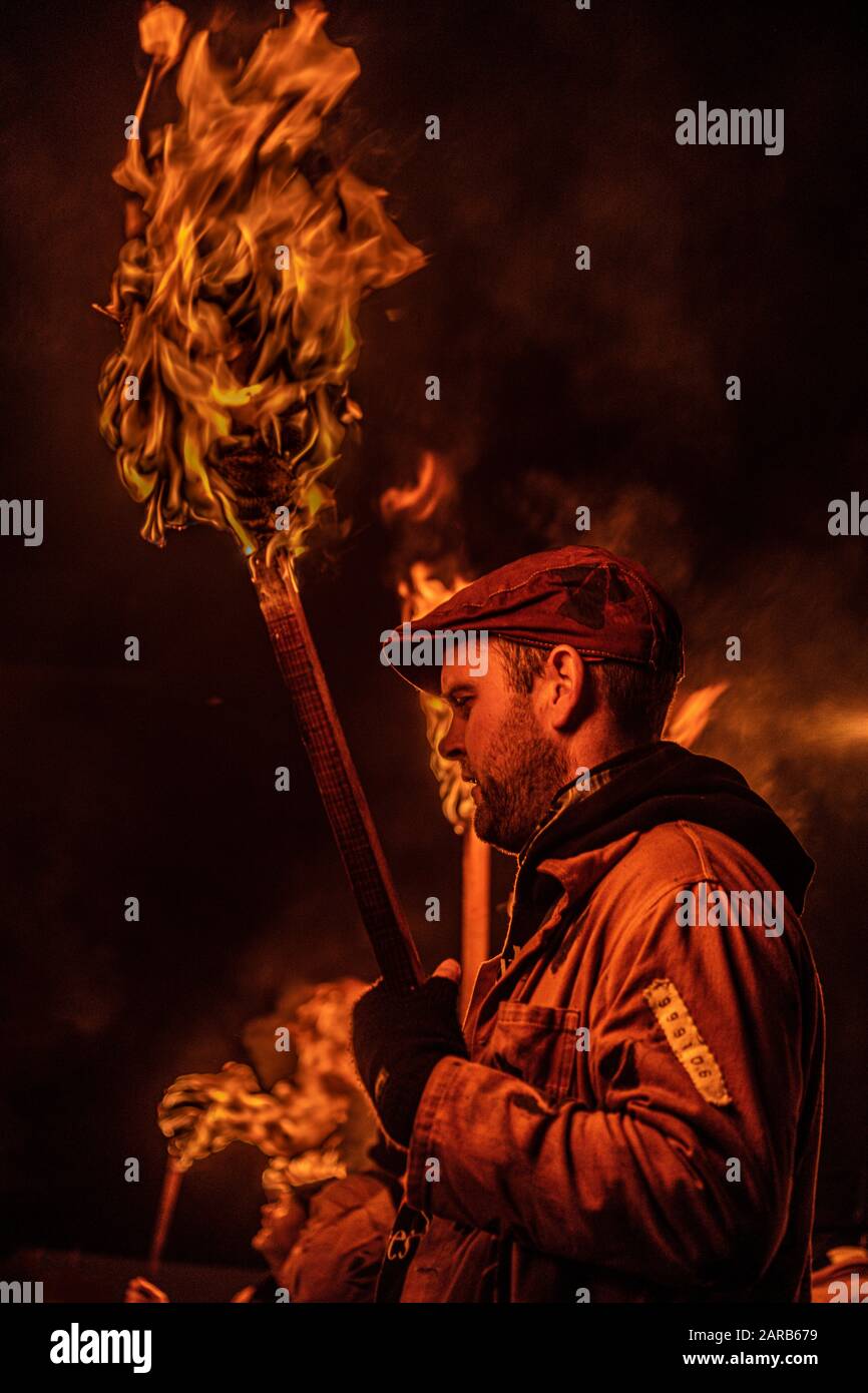 A man walking with a burning torch hi-res stock photography and images ...