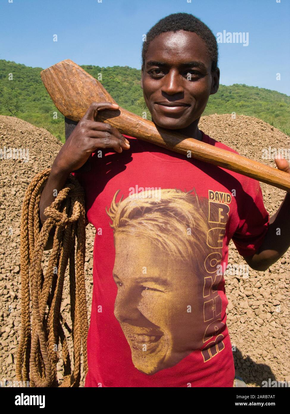Young man from Konso tribe shows his t-shirt with pride, Omo Region ...
